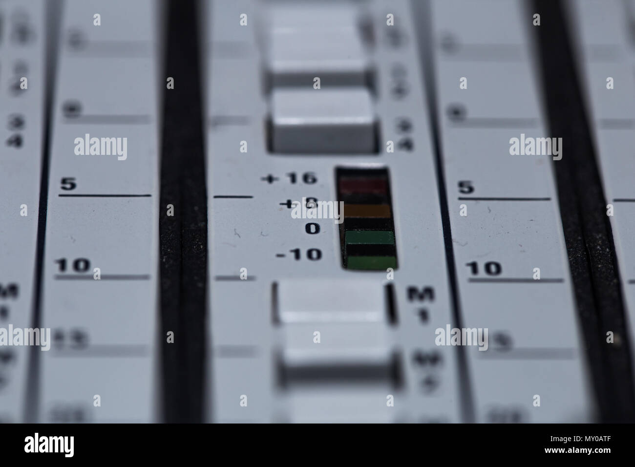 the fader on a mixing console with volume meter, closeup Stock Photo ...