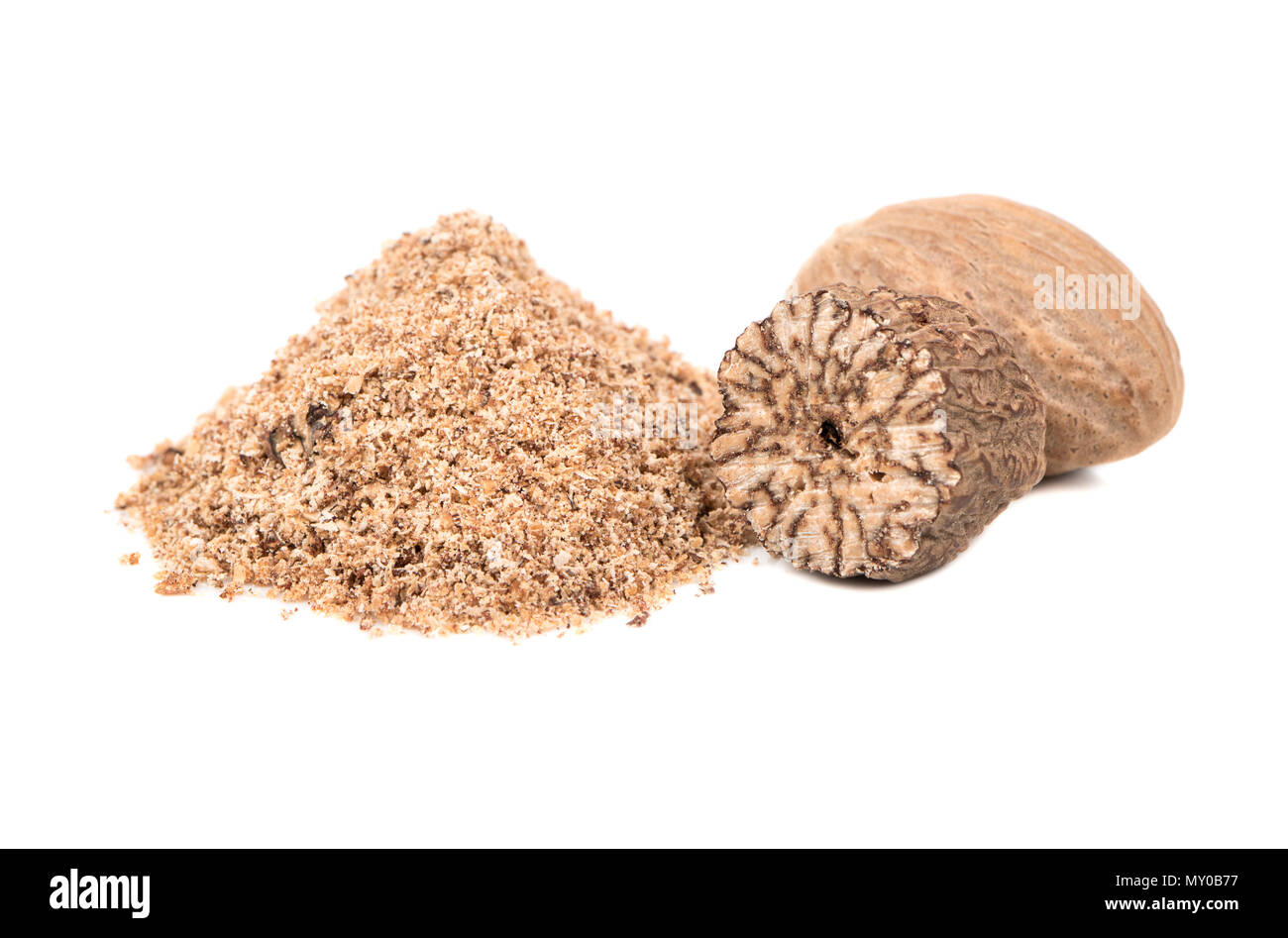 Nutmeg powder with half on white background Stock Photo - Alamy