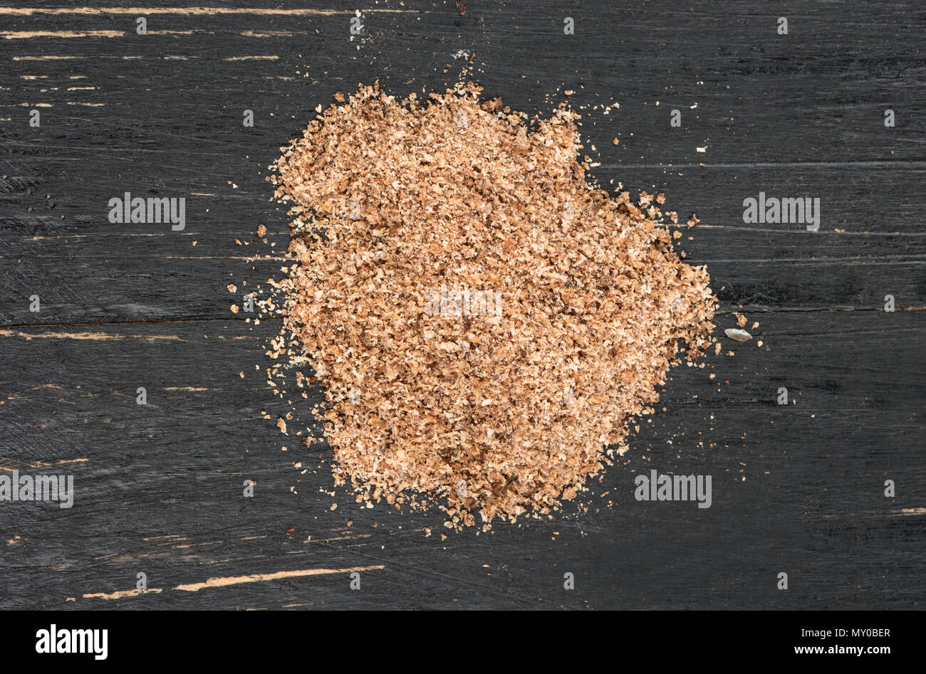 Bunch of nutmeg powder on wooden background, top view Stock Photo - Alamy