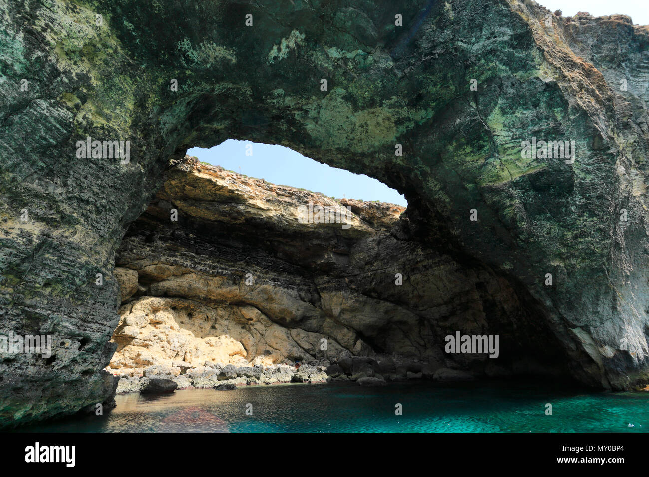 Caves on the coast of Comino Island, Malta Stock Photo - Alamy