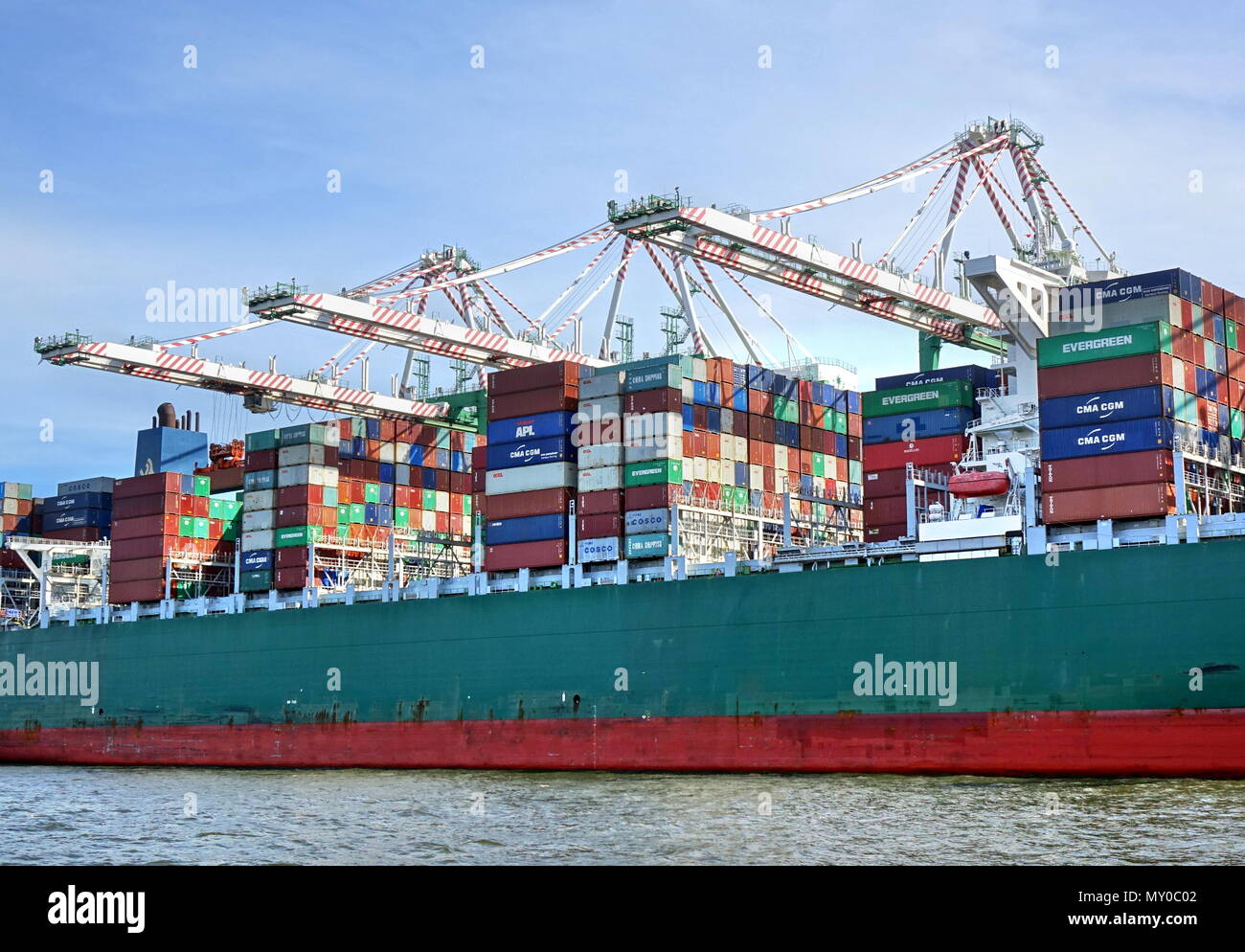KAOHSIUNG, TAIWAN -- MAY 26, 2018: A large container ship is being ...