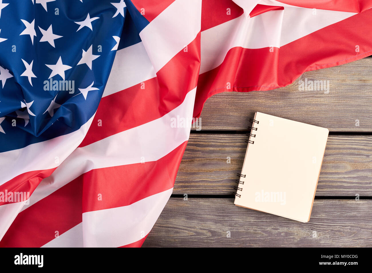 Flag of USA and opened notebook. Top view on flag of United States of ...
