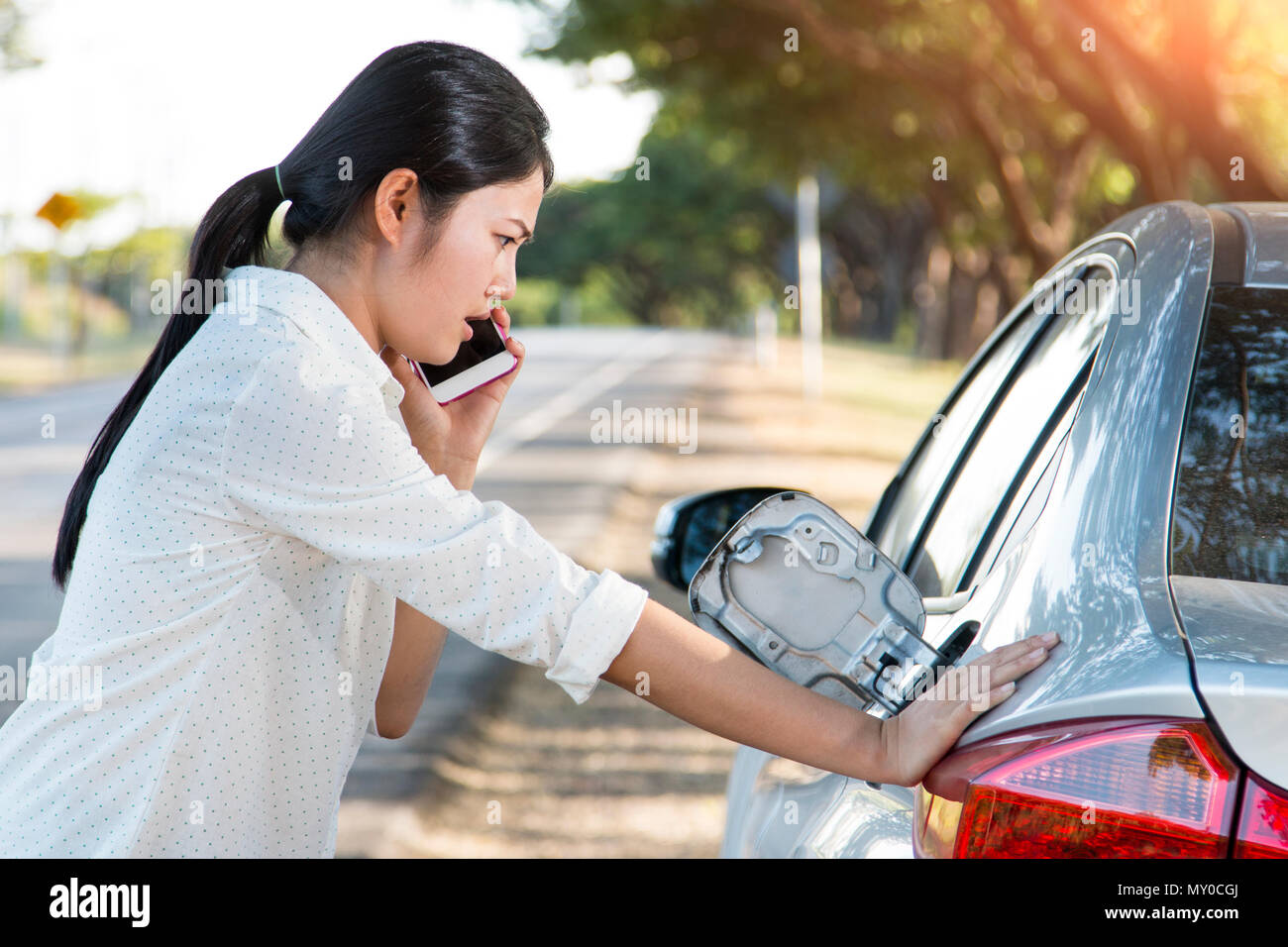 Woman calling help car hi-res stock photography and images - Alamy