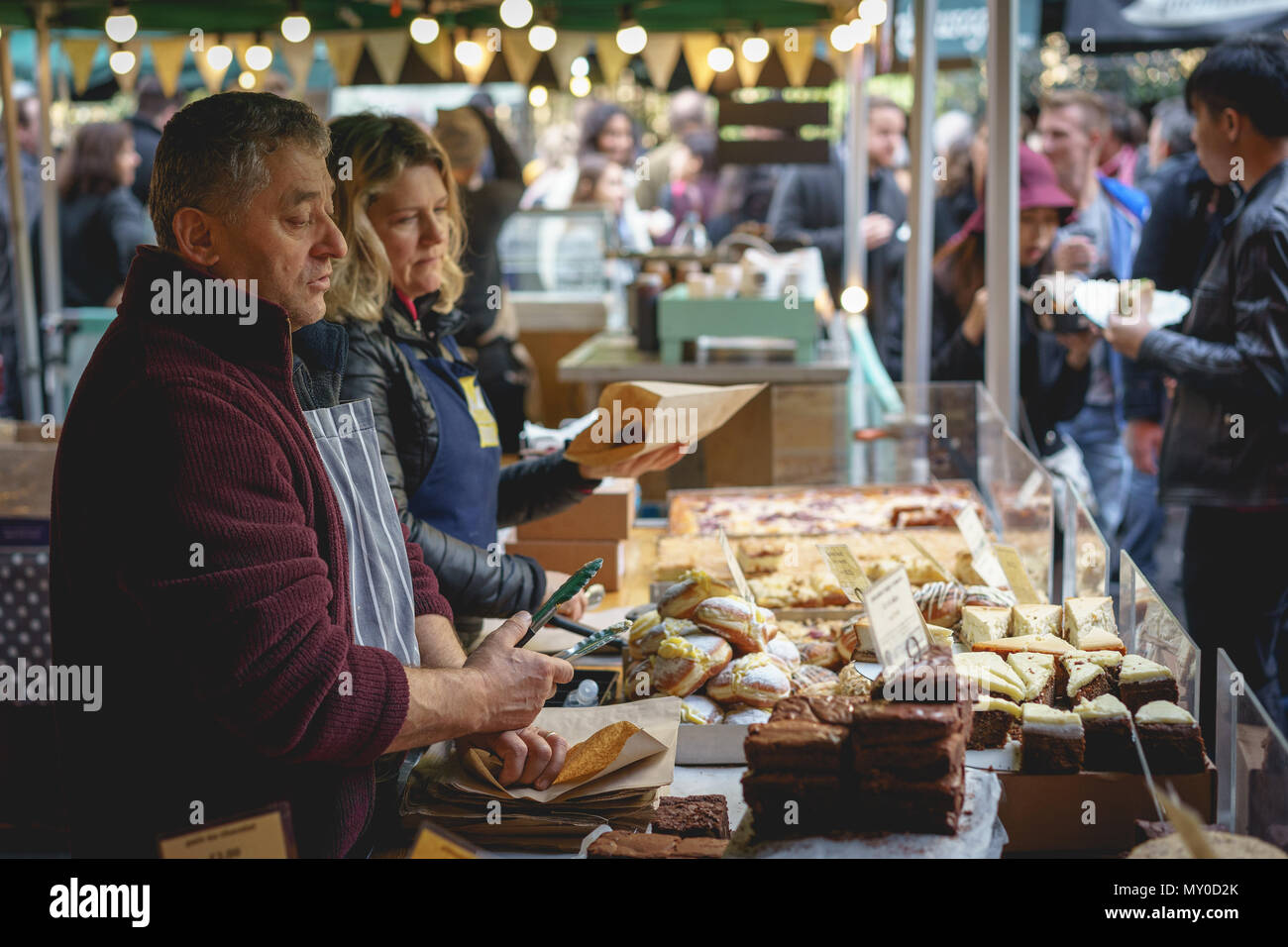 London, UK - November 2017. Bakery stall selling cakes in Borough ...