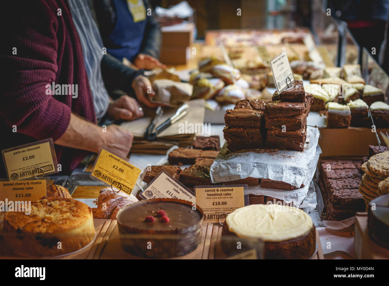 London, UK - November 2017. Bakery stall selling cakes in Borough ...
