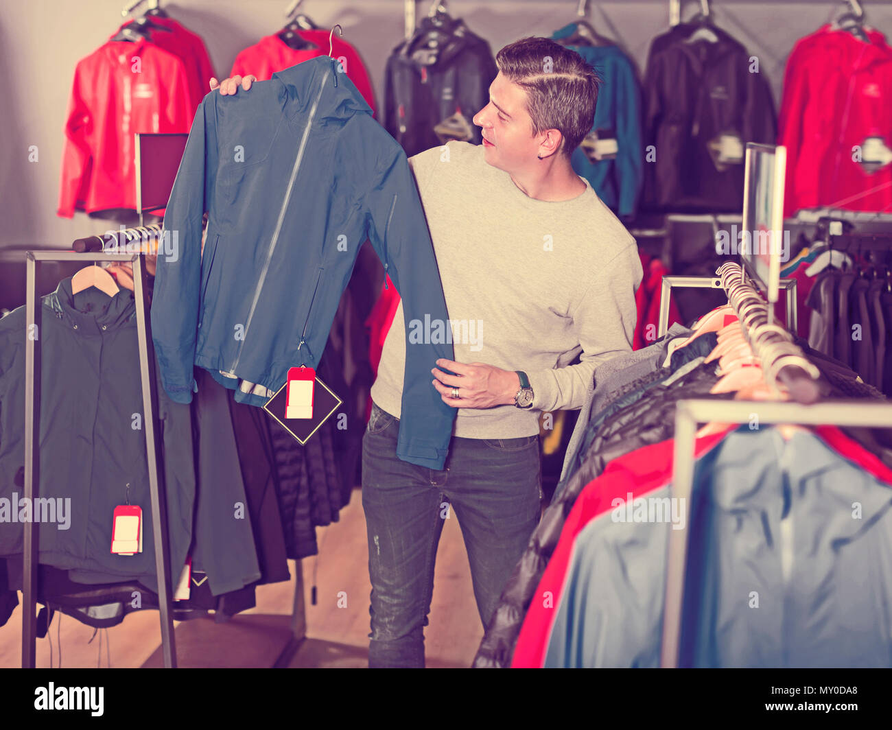Man chooses clothes hi-res stock photography and images - Alamy