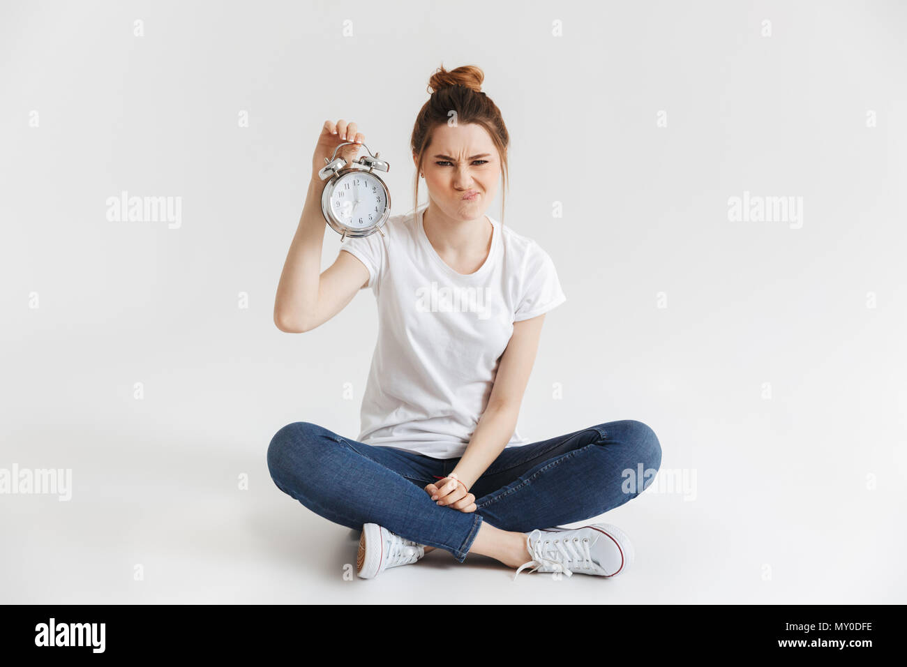 Crossed alarm clock hi-res stock photography and images - Alamy