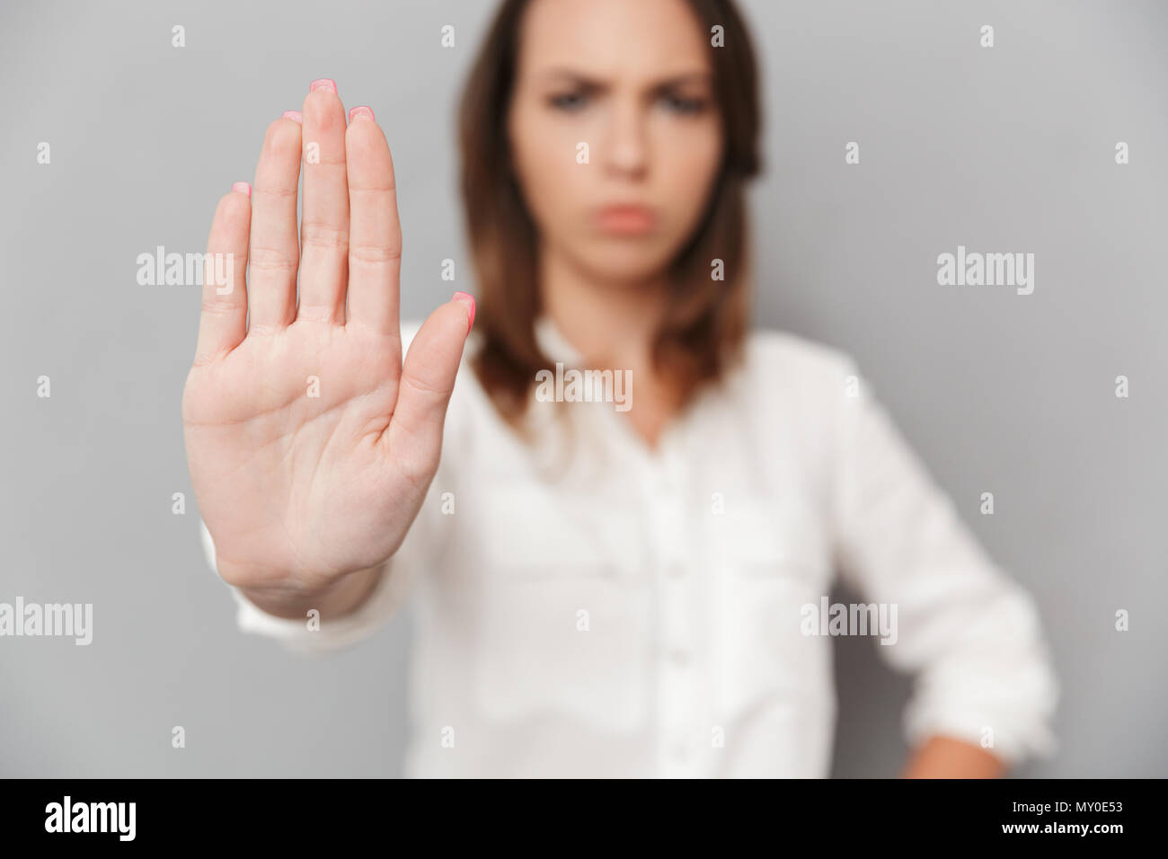 Beautiful girl saying stop hand hi-res stock photography and images - Alamy