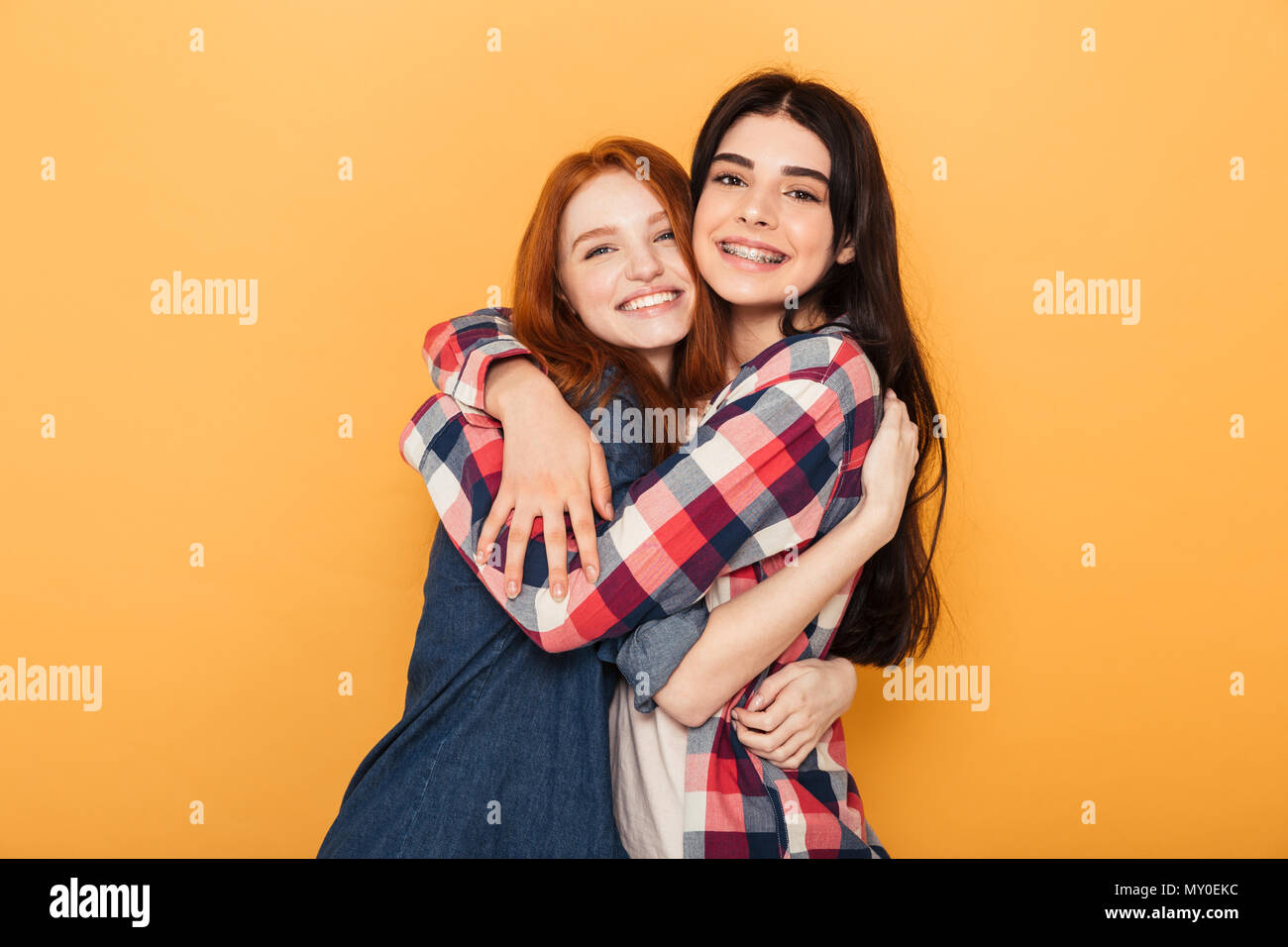 Smiling hugging cute girls best hi-res stock photography and images - Alamy