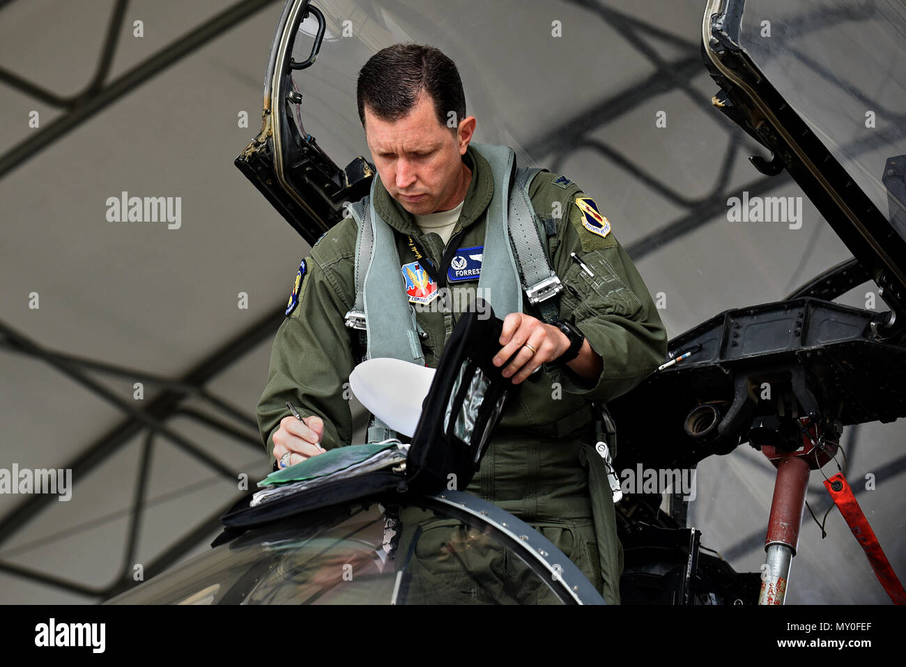 Col. Christopher Sage, 4th Fighter Wing commander, signs aircraft ...