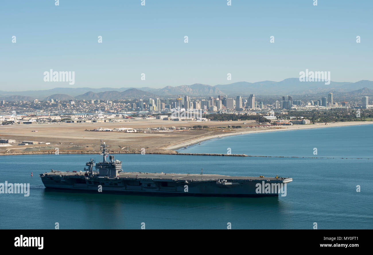 161219-N-ZY005-061 SAN DIEGO (Dec 19, 2016) USS Theodore Roosevelt (CVN 71) departs Air Station ...