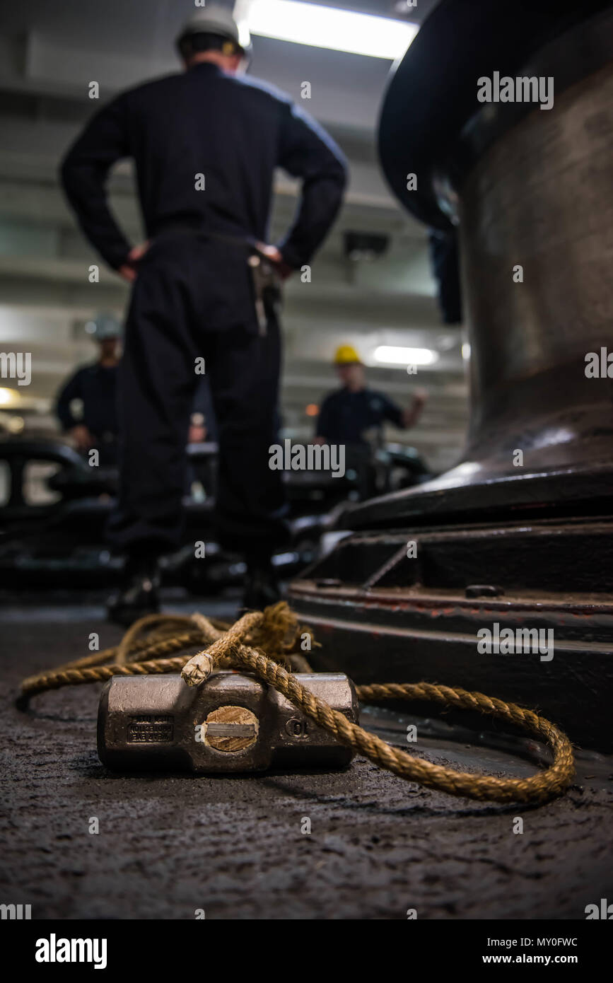 161219-N-MJ153-047 SAN DIEGO (Dec. 19, 2016) Sailors remove the riding ...