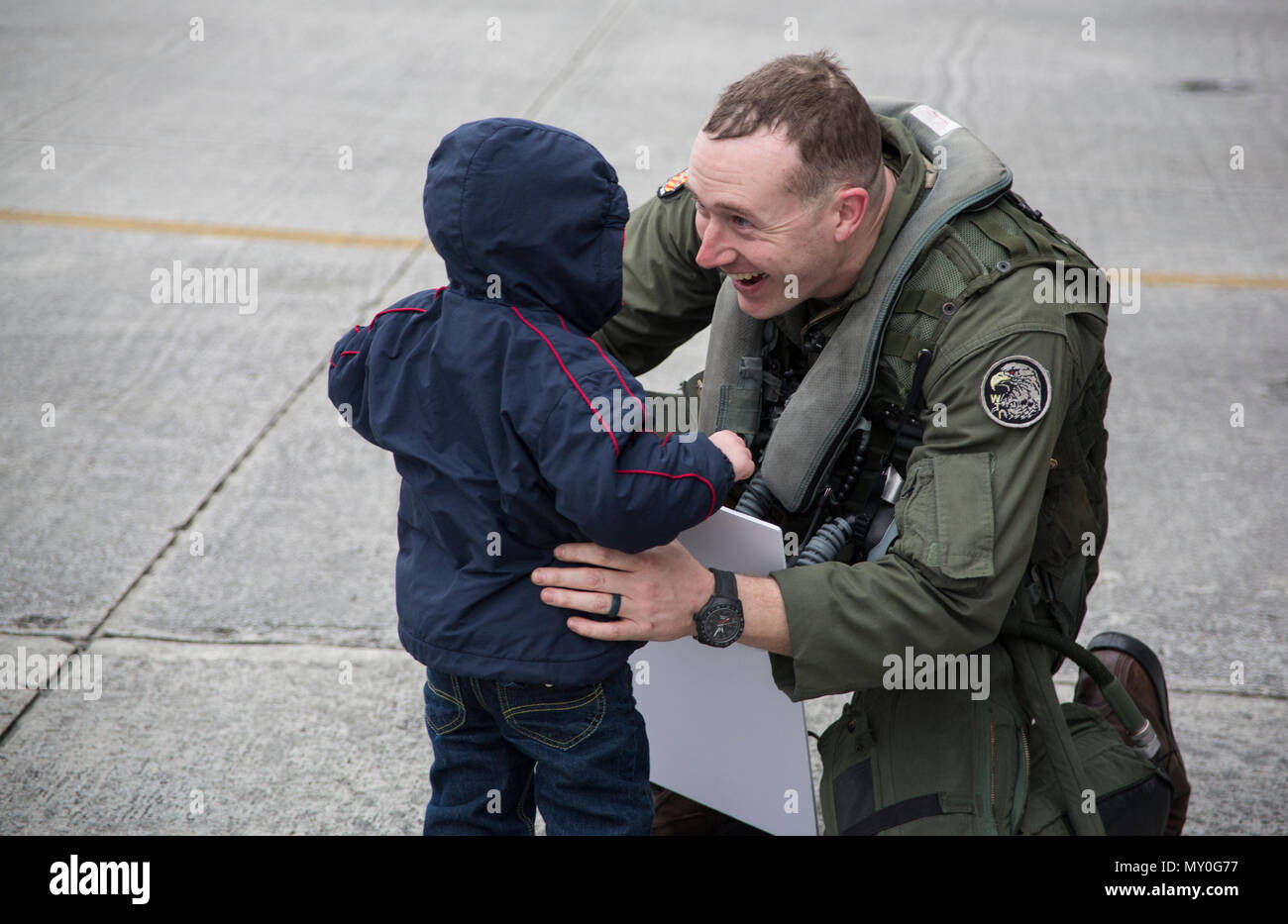 Maj. Nicholas Tyson is welcomed by his son Liam during a homecoming at ...