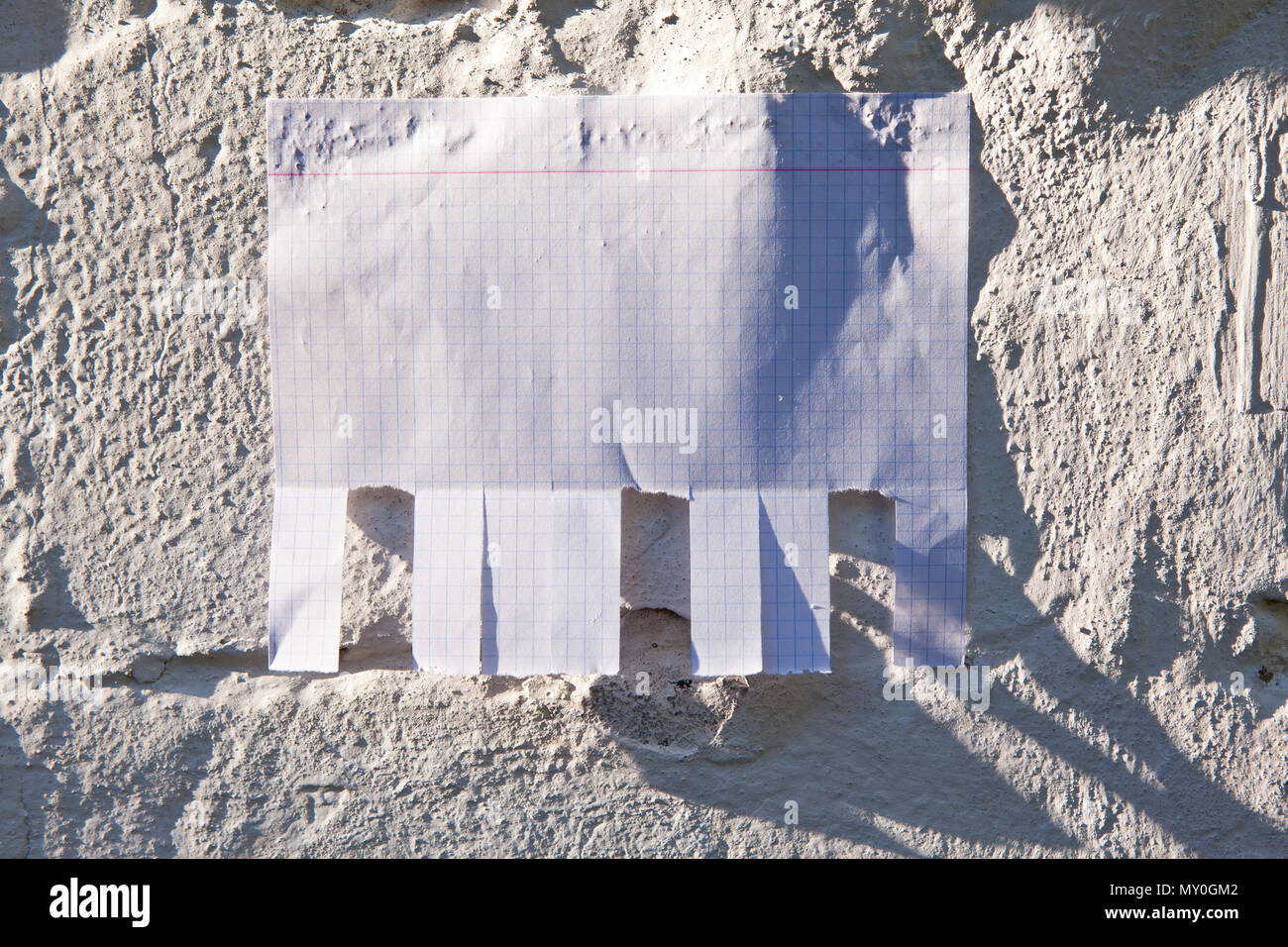 Blank white paper with tear off tabs Stock Photo - Alamy