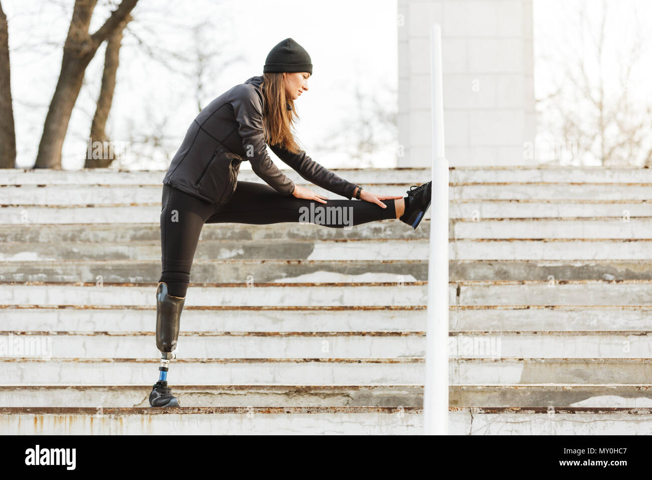Image of disabled running girl in sportswear doing sports and ...