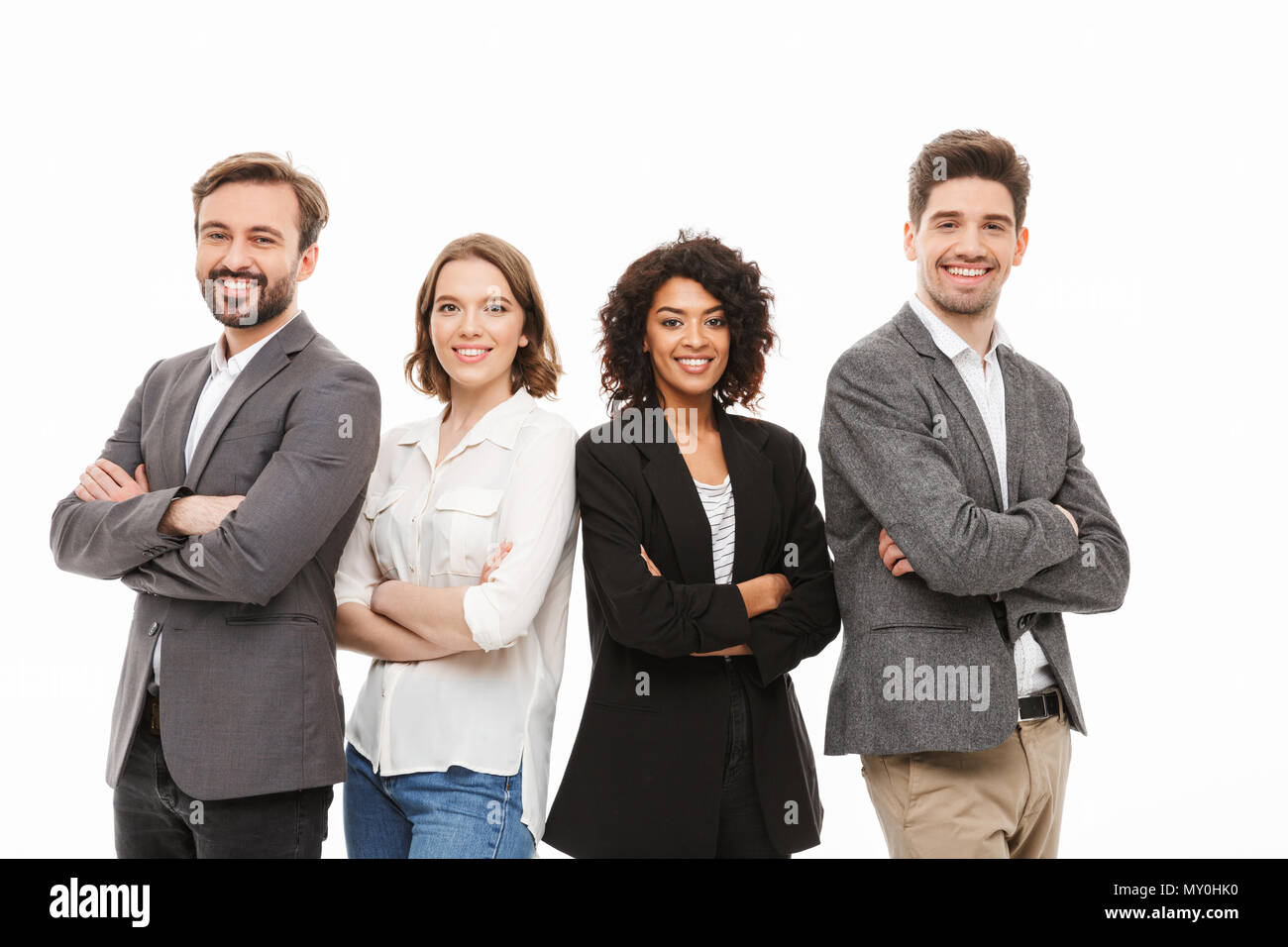 Group of happy multiracial business people standing with arms folded ...