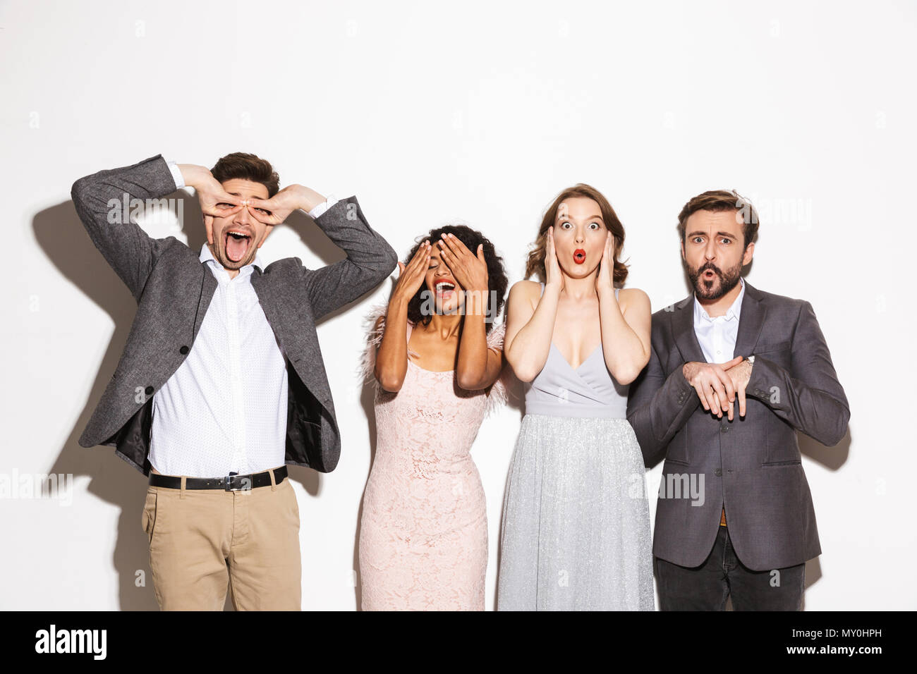 Group of happy well dressed multiracial people having fun and grimacing ...
