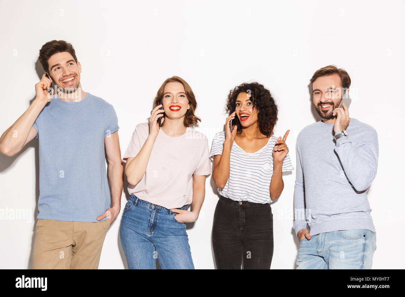 Group of happy multiracial people talking on mobile phones isolated ...