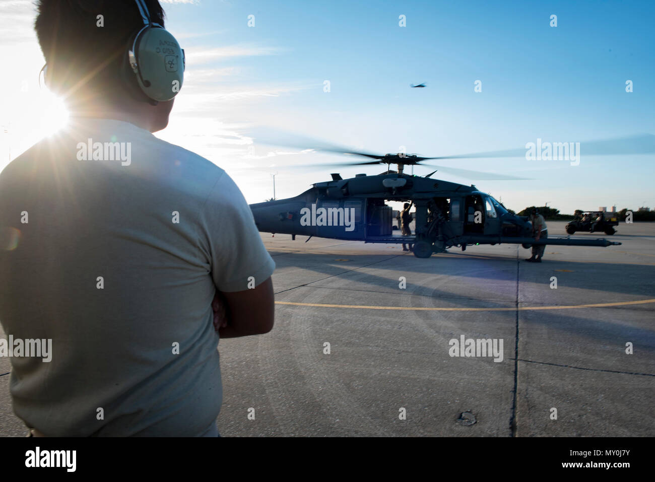 Senior Airman Aaron Mier, 41st Helicopter Maintenance Unit crew chief ...