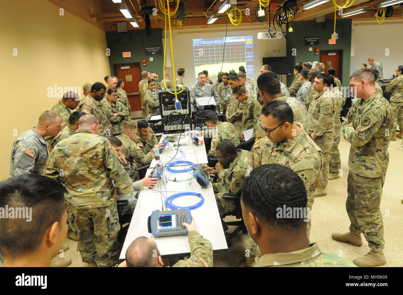 U.S. Air Force Master Sgt. Joshua Carter, center, flight chief ...