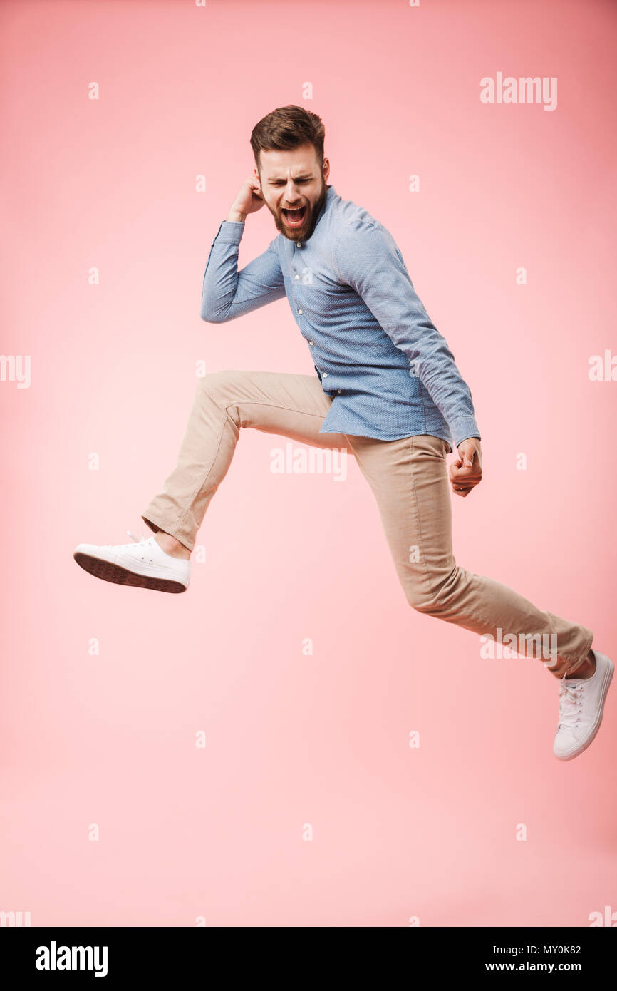 Excited student jumping hi-res stock photography and images - Alamy