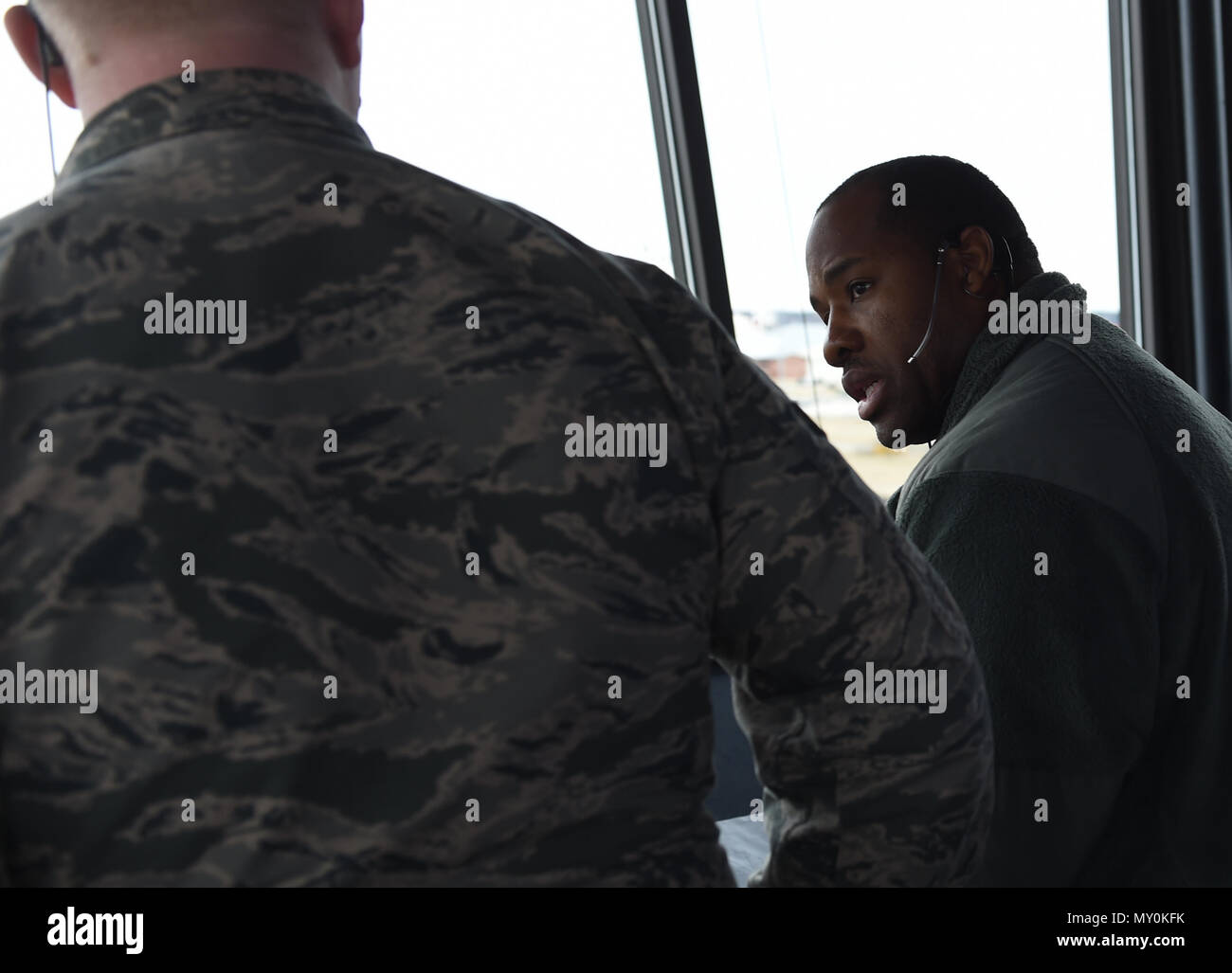 U.S. Air Force Senior Airman Chino Ross, right, 1st Operations Support ...