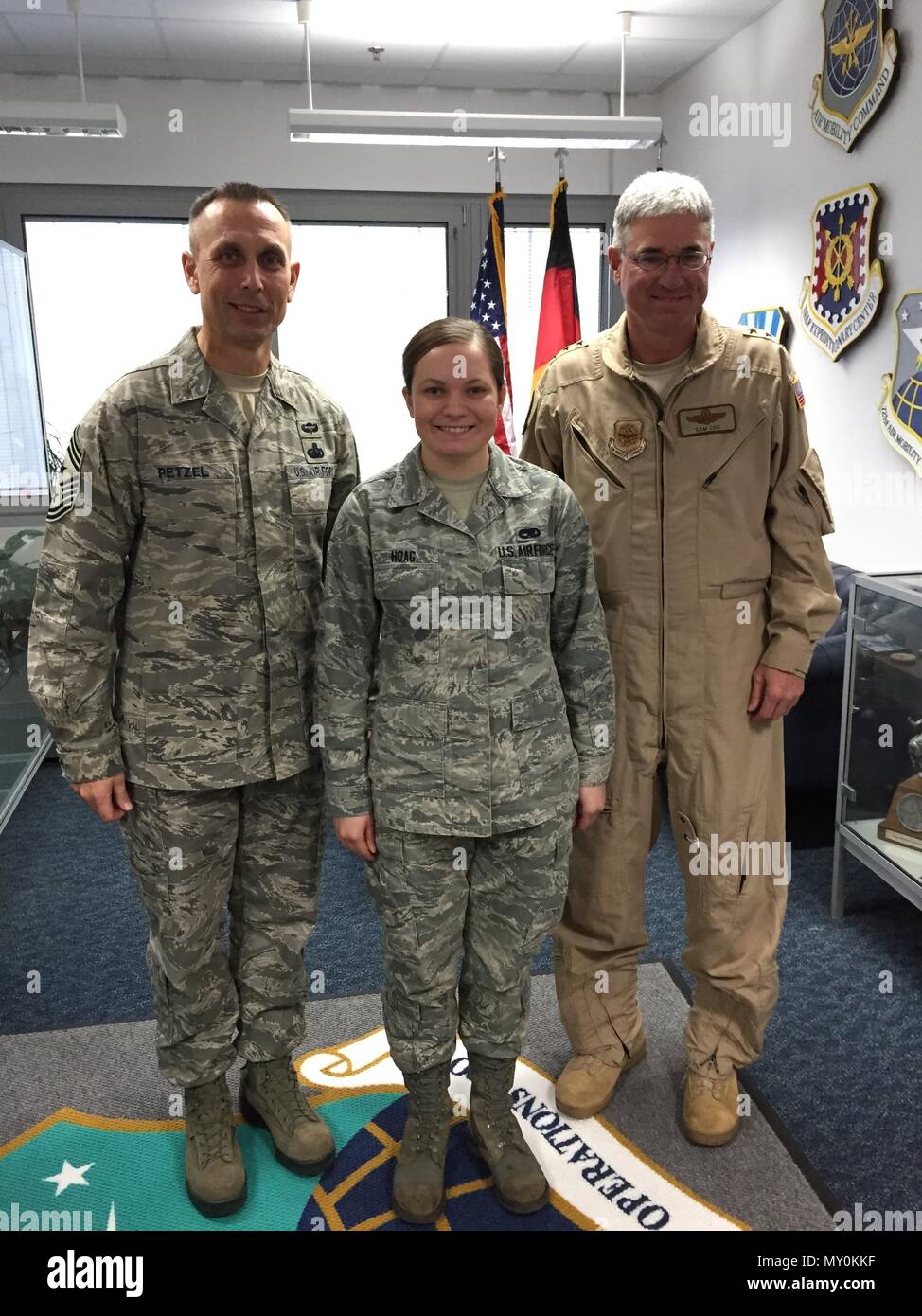 Senior Airman Hoag stands with Chief Master Sgt. Petzel, Command Chief ...