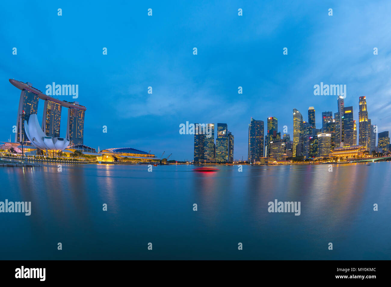 Singapore city skyline with Marina Bay at night Stock Photo - Alamy