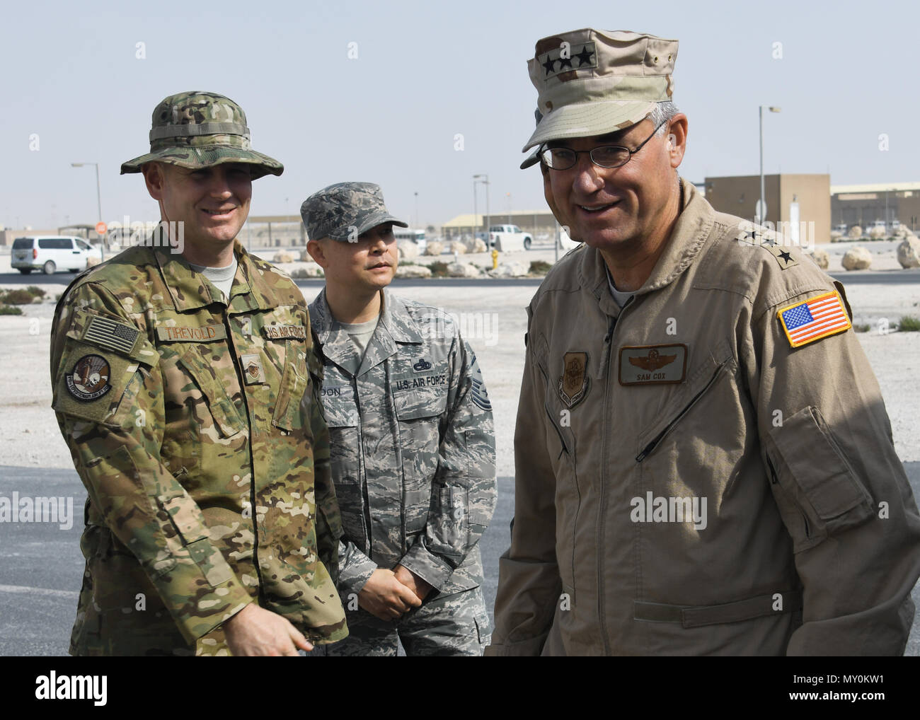 Lt. Gen. Sam Cox, commander of the 18th Air Force, greets Airmen as he ...