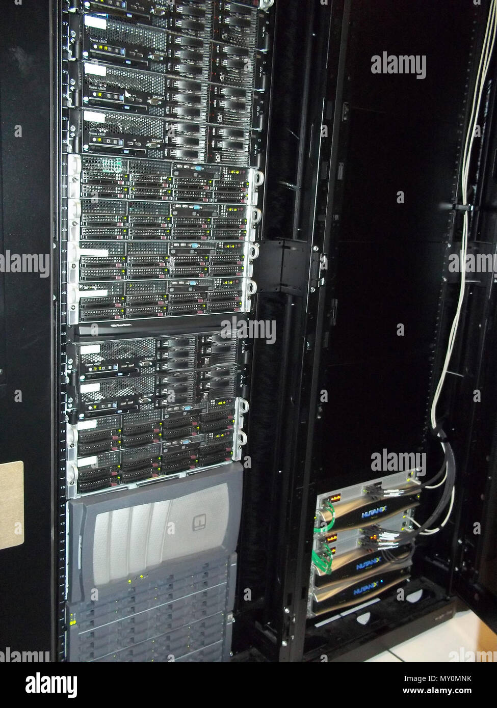 Pictured on the left is a rack that housed servers, switches and ...