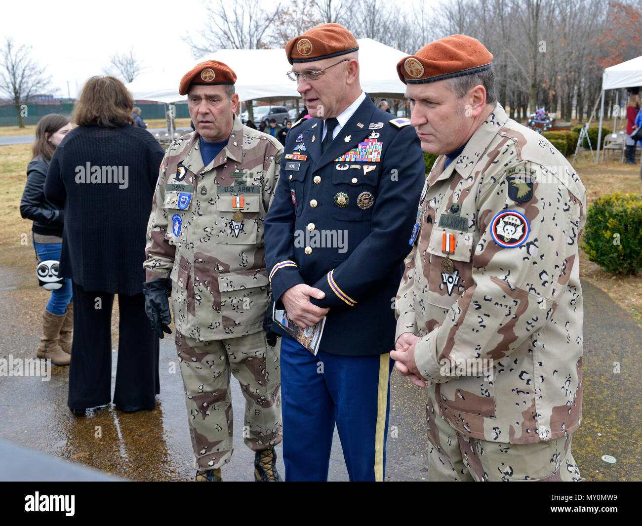 U.S. Army retired Sgt. 1st Class Joseph Casper, left, an infantryman ...
