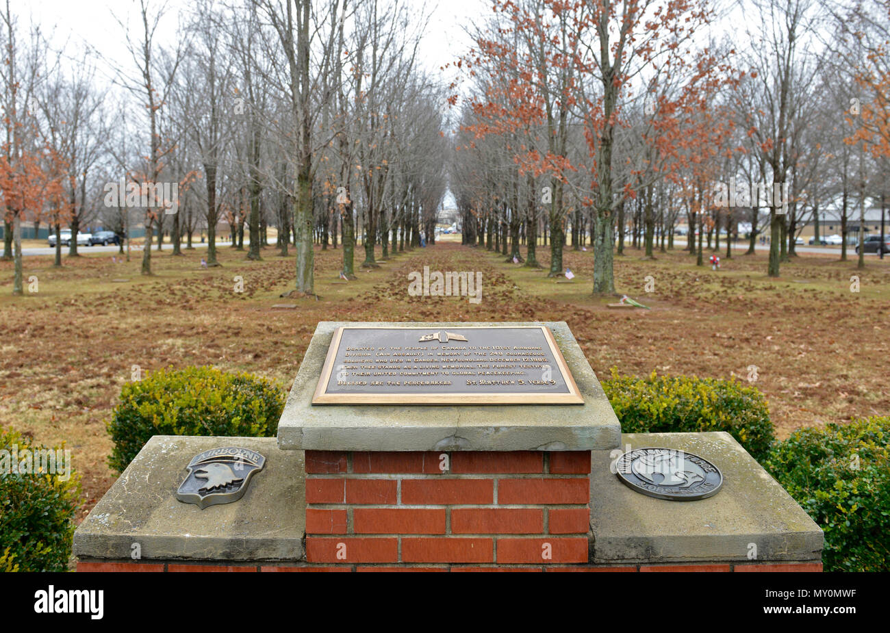 The Gander Memorial marker, in front of the memorial tree park, during ...