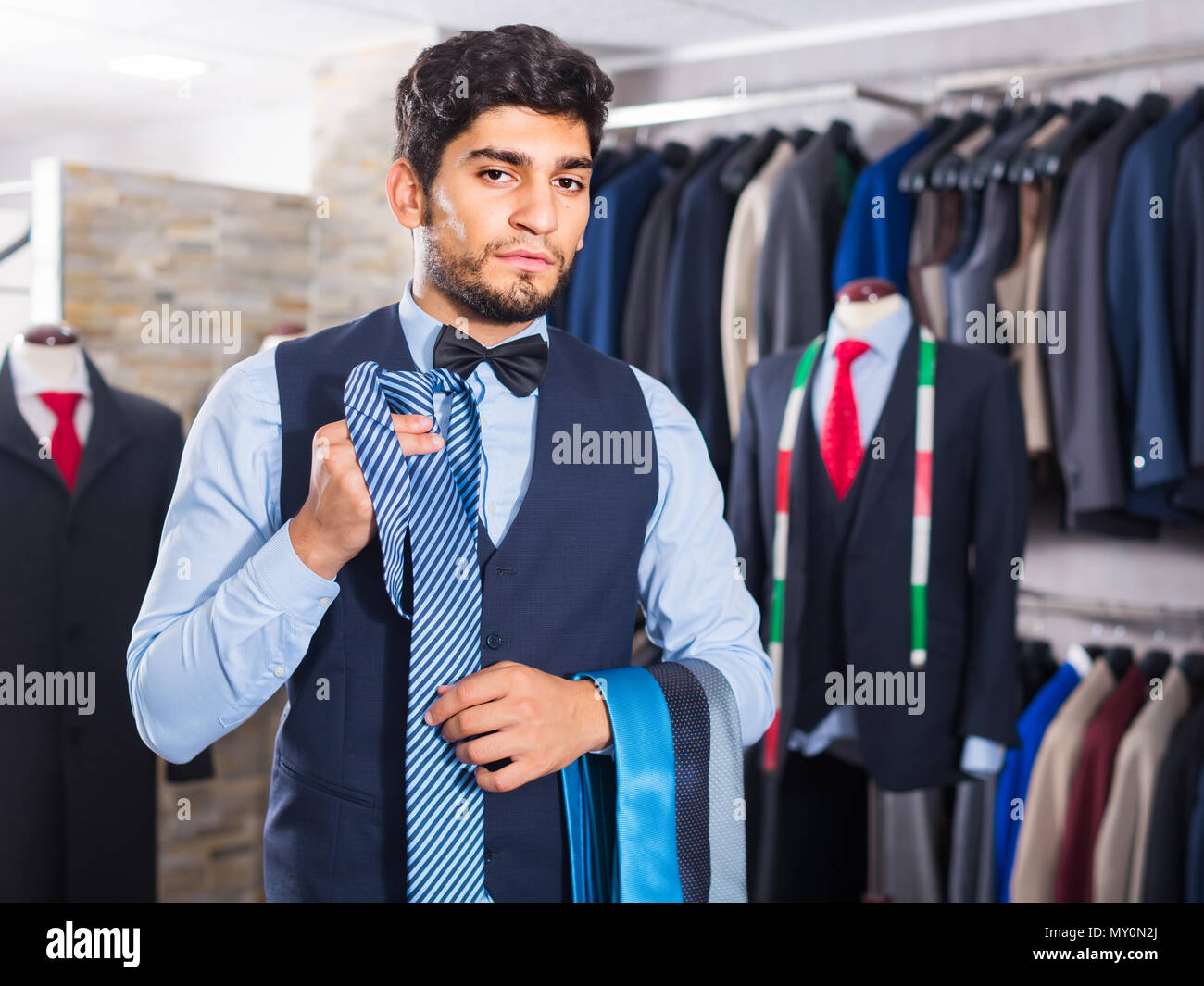 Guy picking up shop hi-res stock photography and images - Alamy