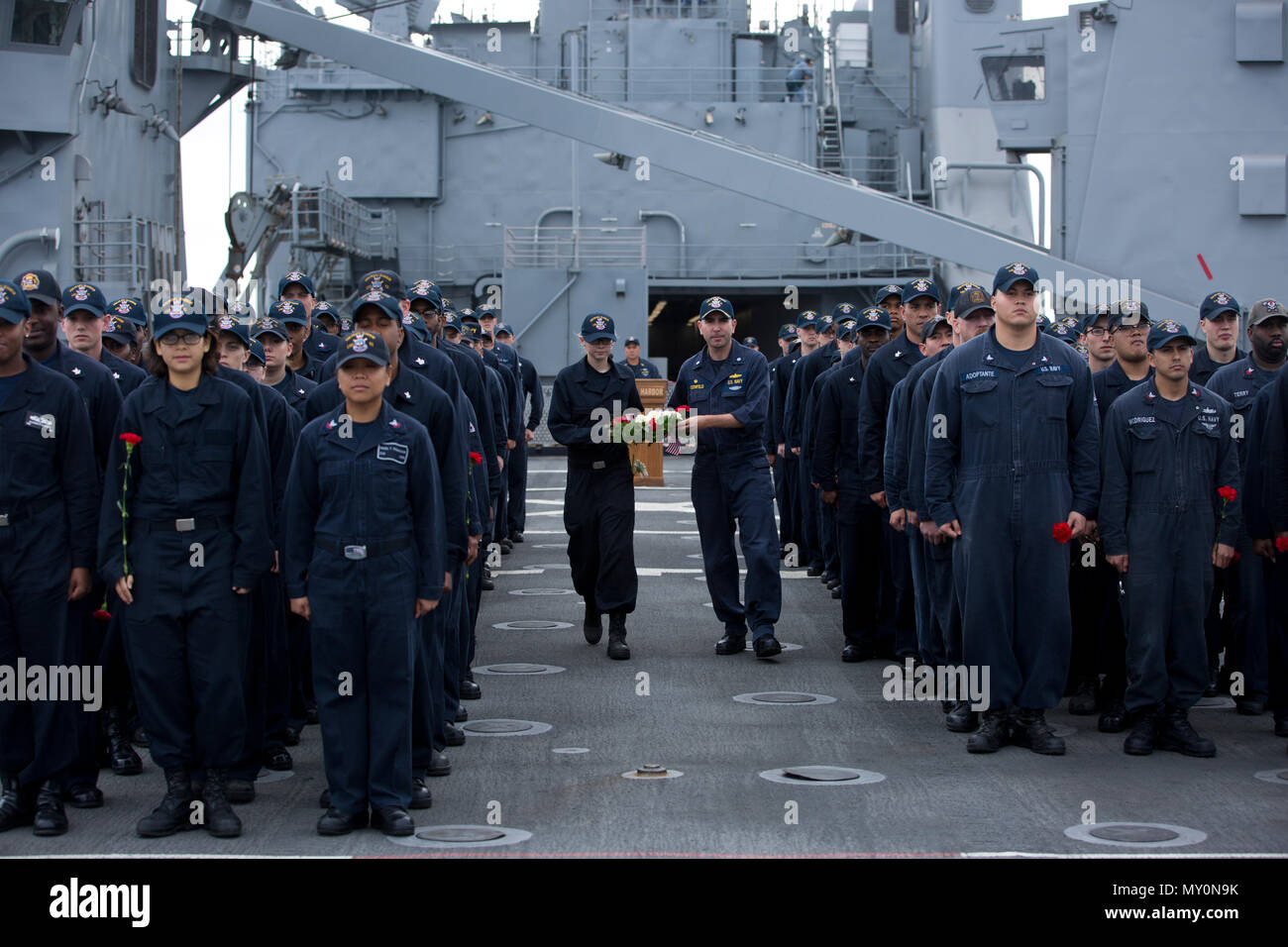 U.S. Navy Seaman Brooke A. Kelly, left, with the Deck Department, USS ...