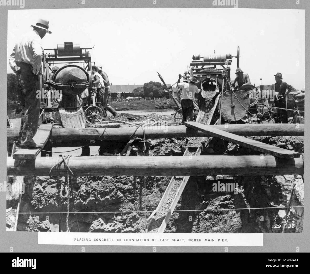 Placing concrete in foundation of east shaft north main pier Stock ...