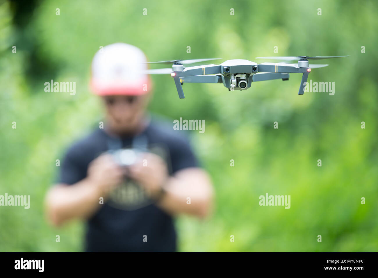 Man with remote controller hi-res stock photography and images - Alamy
