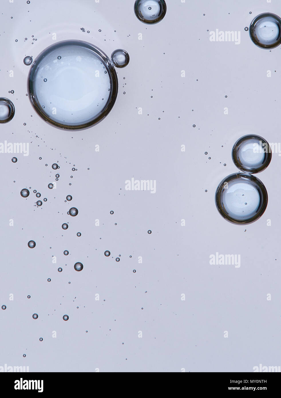 Full frame of the textures formed by the bubbles and drops of oil in ...