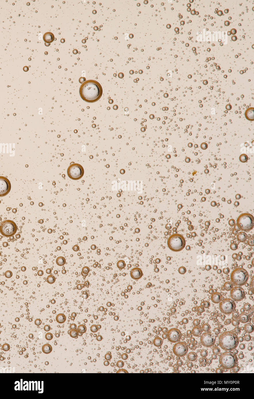 Full frame of the textures formed by the bubbles and drops of oil in ...