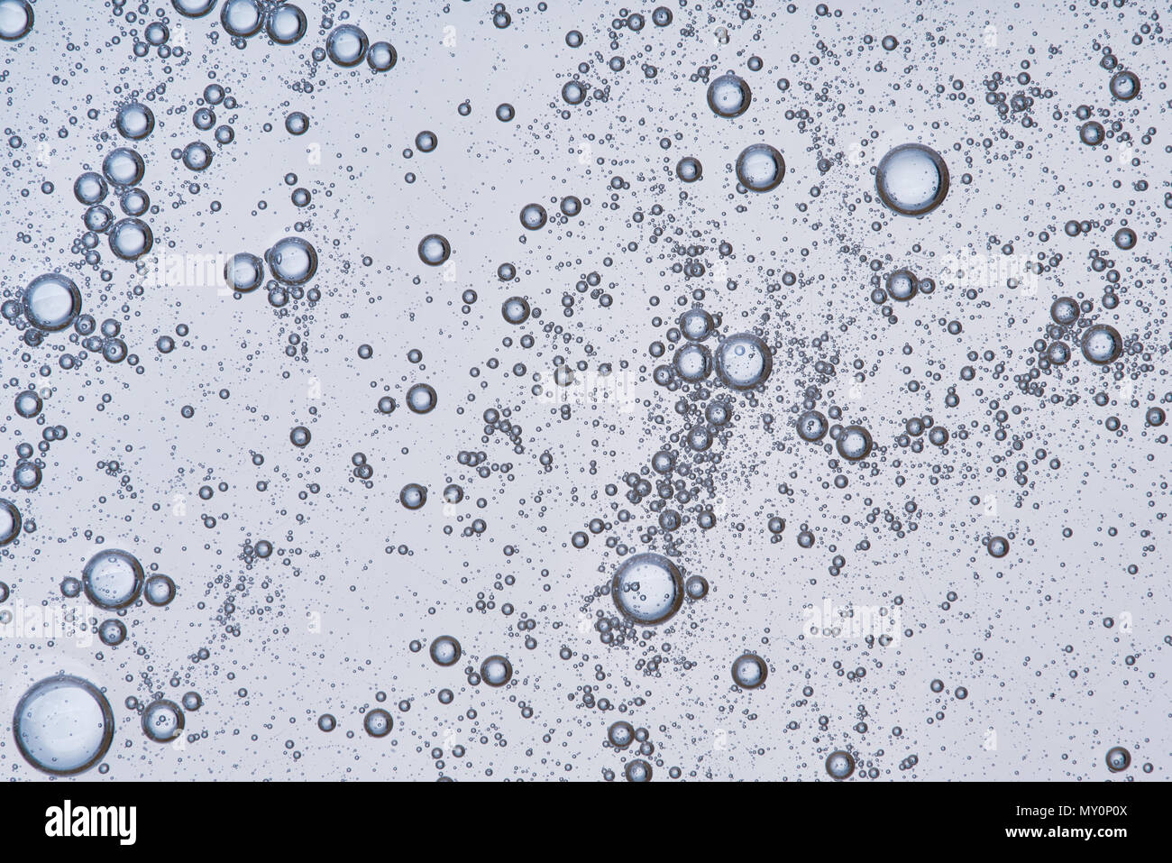 Full frame of the textures formed by the bubbles and drops of oil in ...