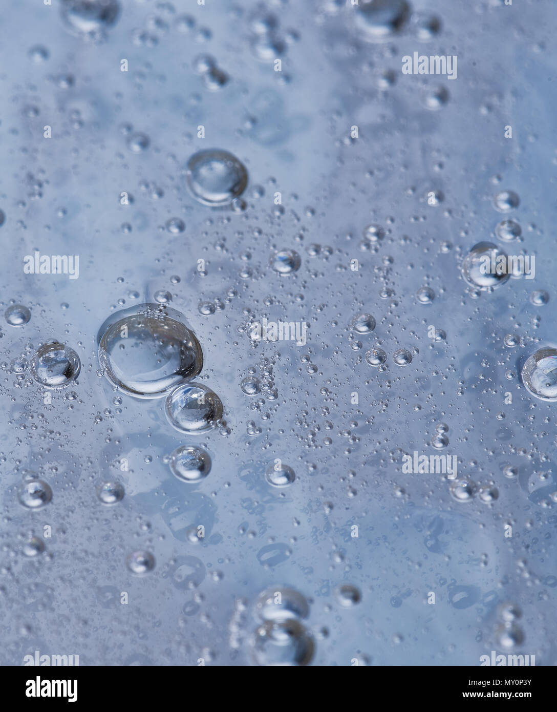 Full frame of the textures formed by the bubbles and drops of oil in ...
