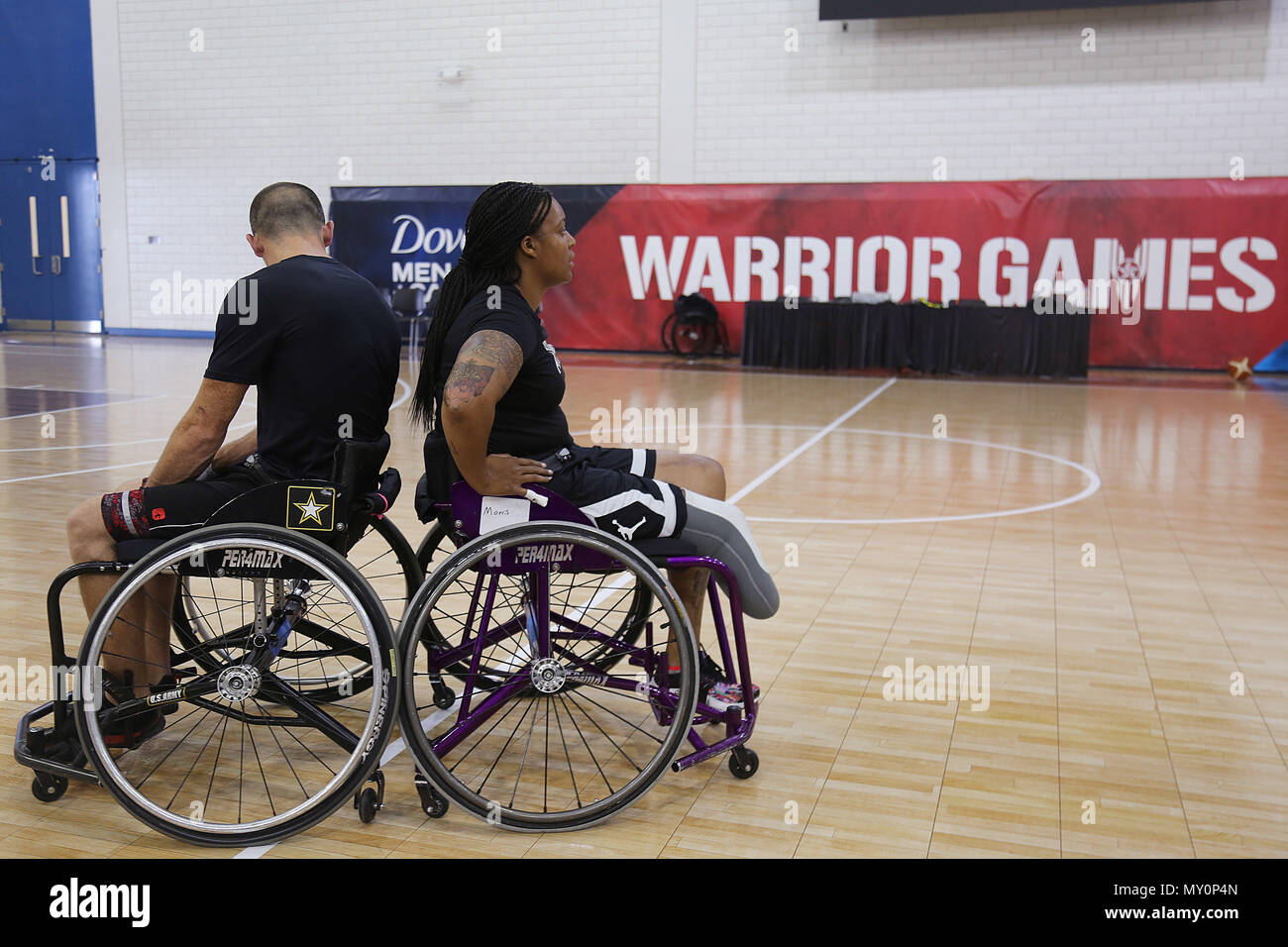 U.S. Army Staff Sgt. Shawn Runnells (left) and Spc. Stephanie Johnson ...