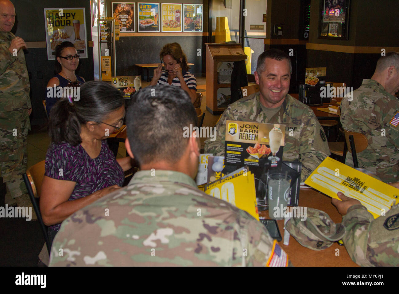 Friends and co-workers come together at Buffalo Wild Wings in Sierra ...