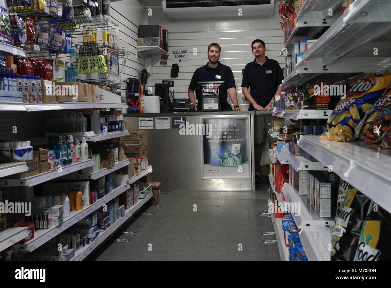 Two workers await the next customer at the new AAFES Mobile Field ...