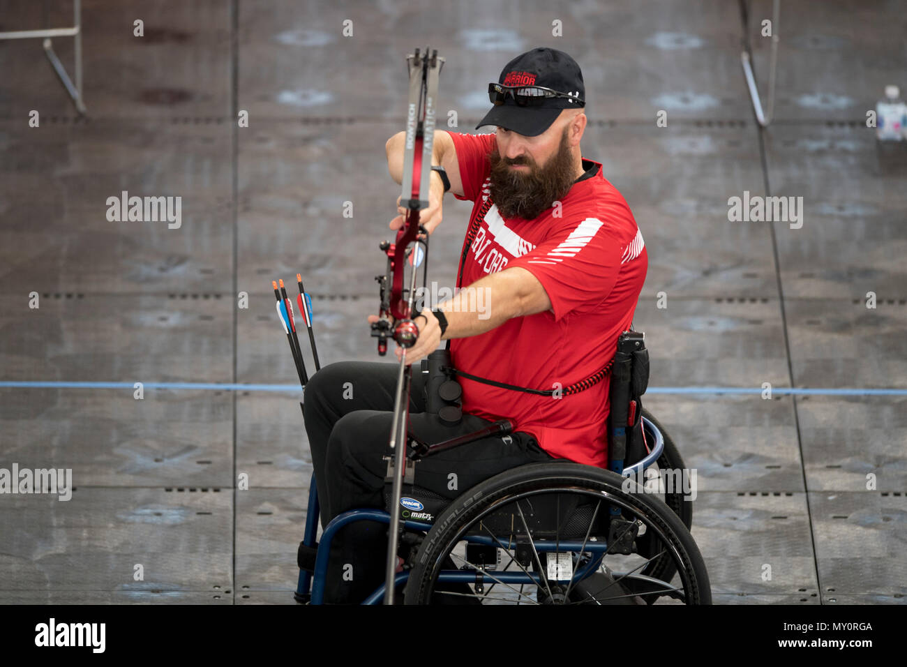 Marine Corps Gunnery Sgt. Doug Godfrey draws his bow during practice ...