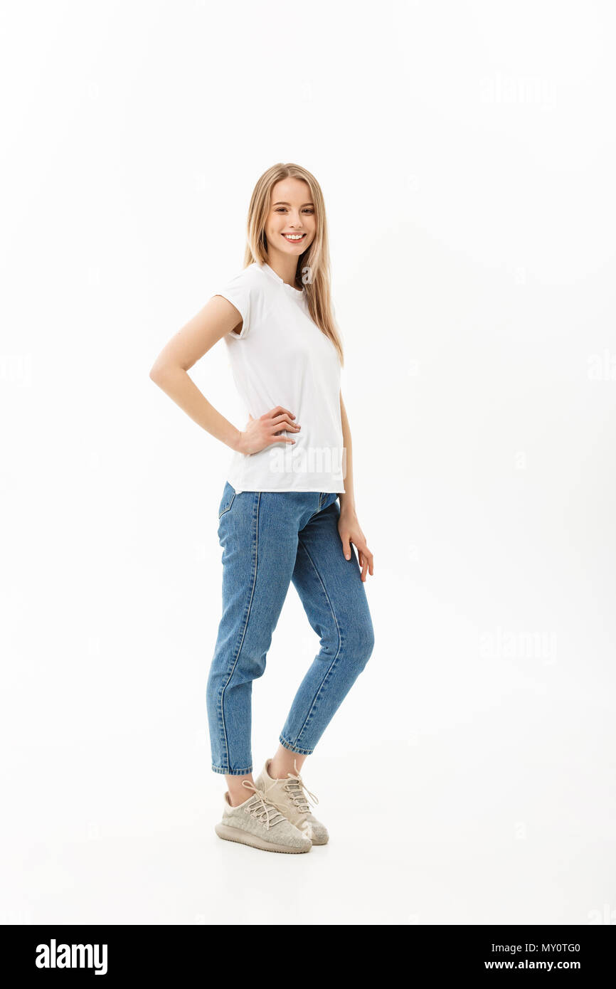 Beautiful standing woman model posing isolated on a white background ...