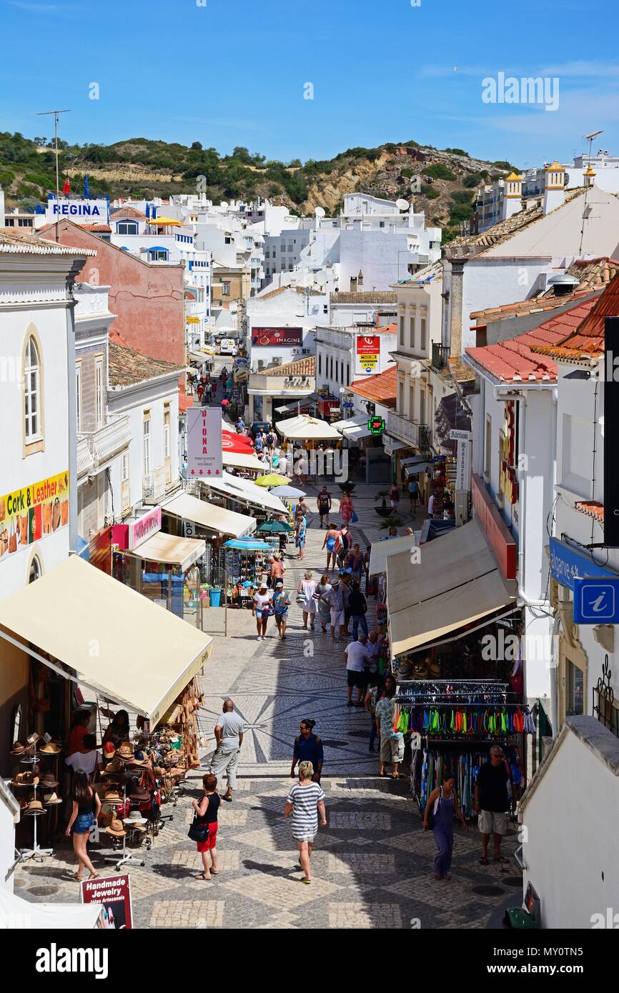 Elevated view of tourists walking along the Rua 5 Octubro shopping ...
