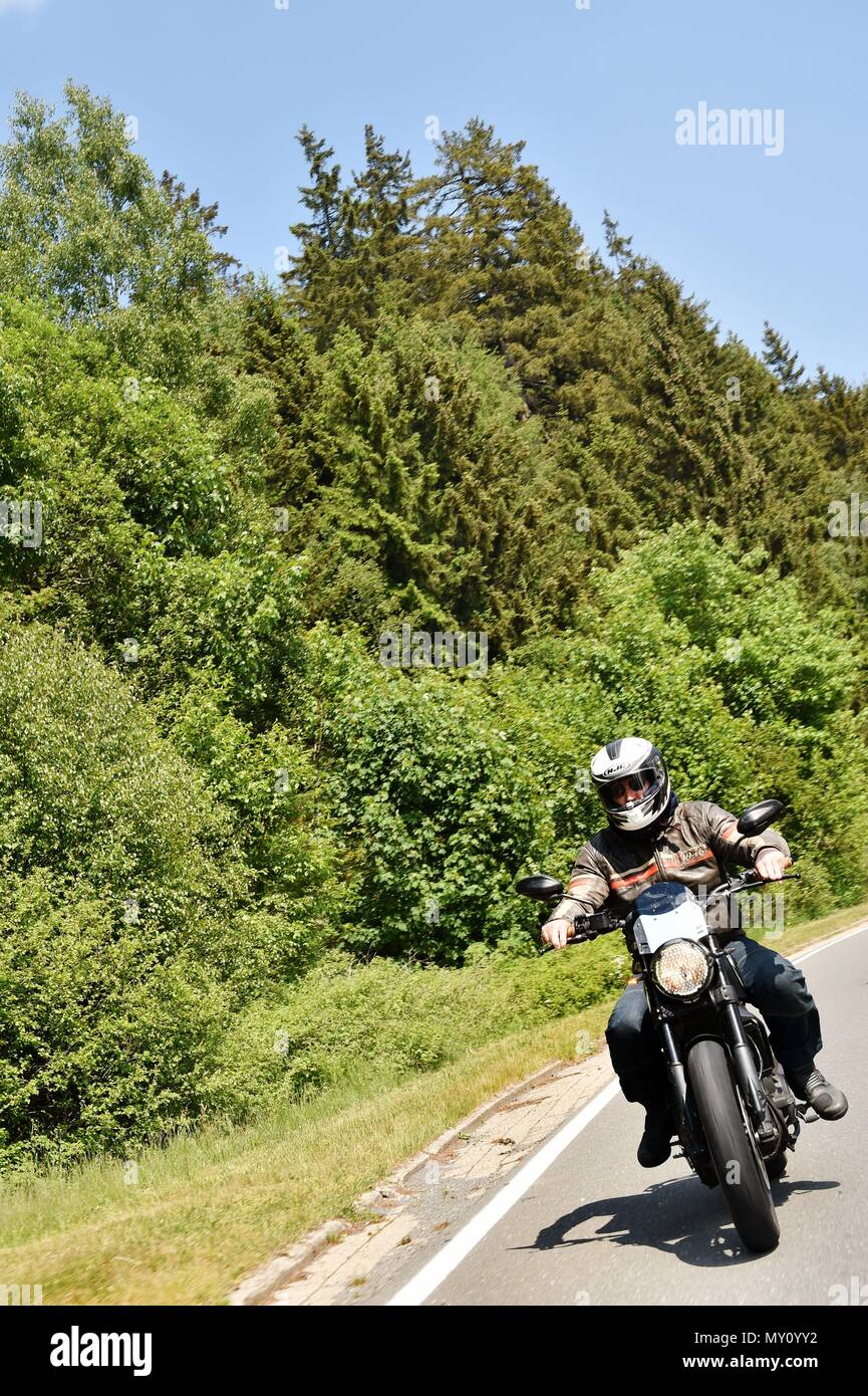 Schulenberg, Germany. 26th May, 2018. A motorcycle rider in the Harz ...
