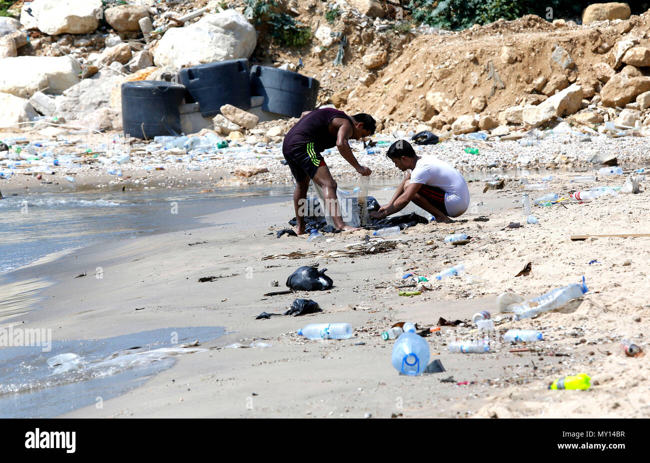 Beirut, Lebanon. 5th June, 2018. Two men check their catch on a ...