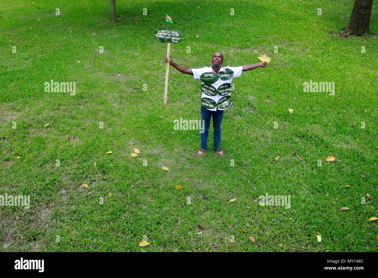 Dhaka, Bangladesh - June 05, 2018: Deepak Chandra Das is walking around ...