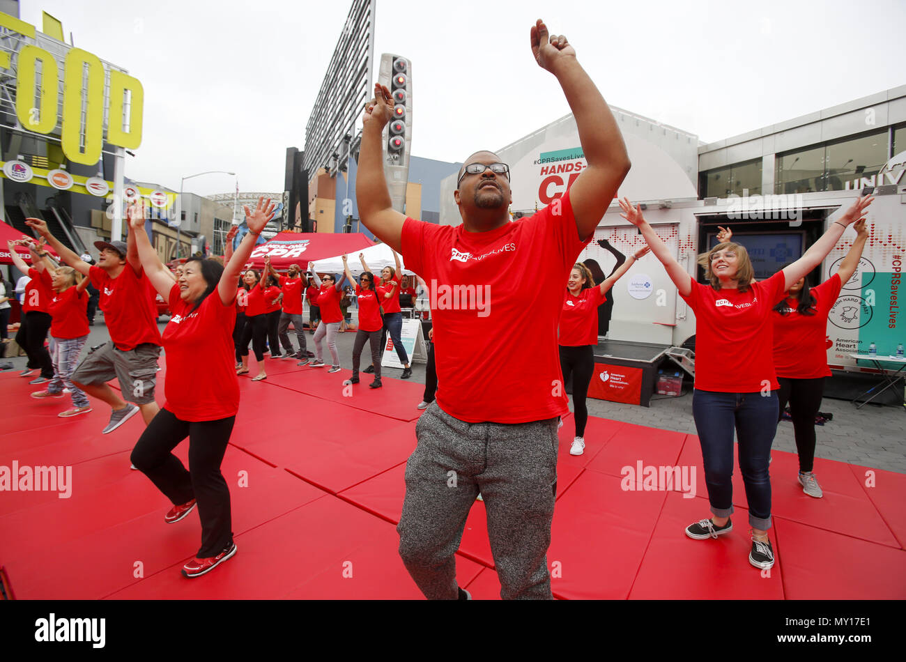 Los Angeles, California, USA. 5th June, 2018. Volunteers dance before a ...